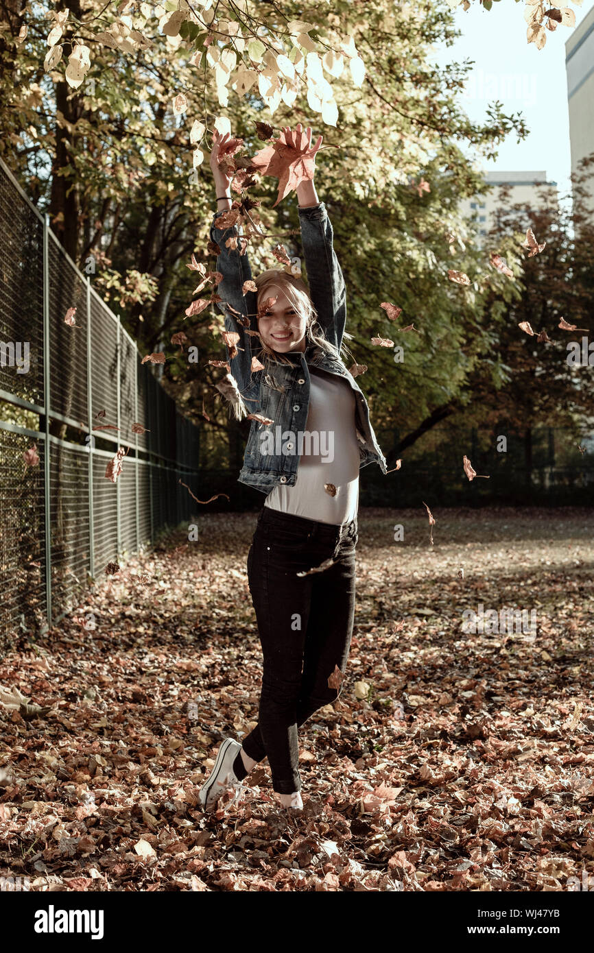 Throwing the leaves hi-res stock photography and images - Alamy