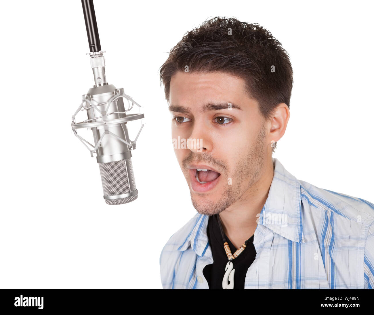 Young singer and microphone. Isolated on white Stock Photo - Alamy