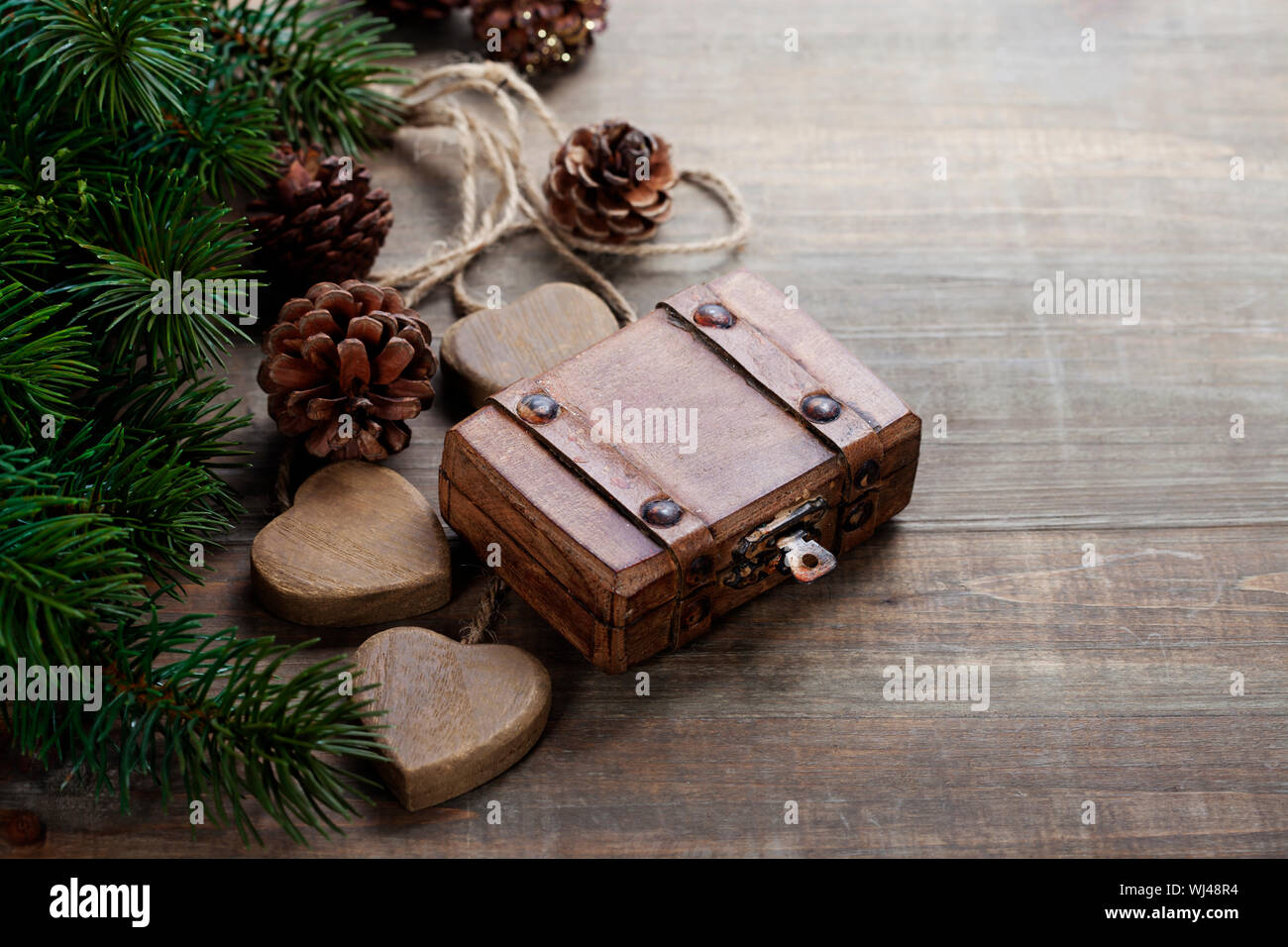 Christmas border design on the wooden background Stock Photo - Alamy