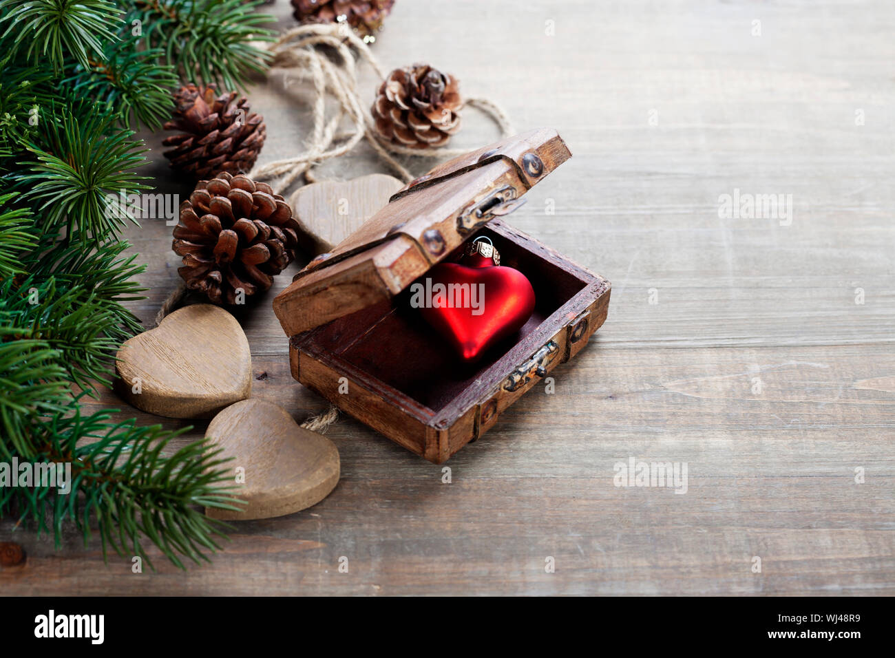 Christmas border design on the wooden background Stock Photo - Alamy