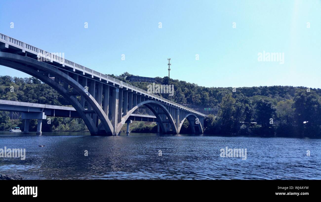Bridge Over Calm Lake Stock Photo - Alamy