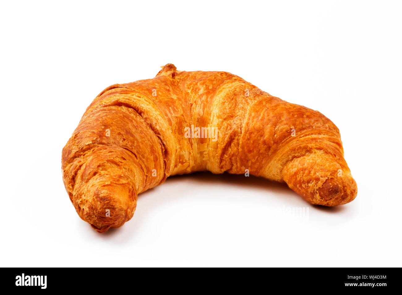 crusty brown croissant on white background Stock Photo - Alamy