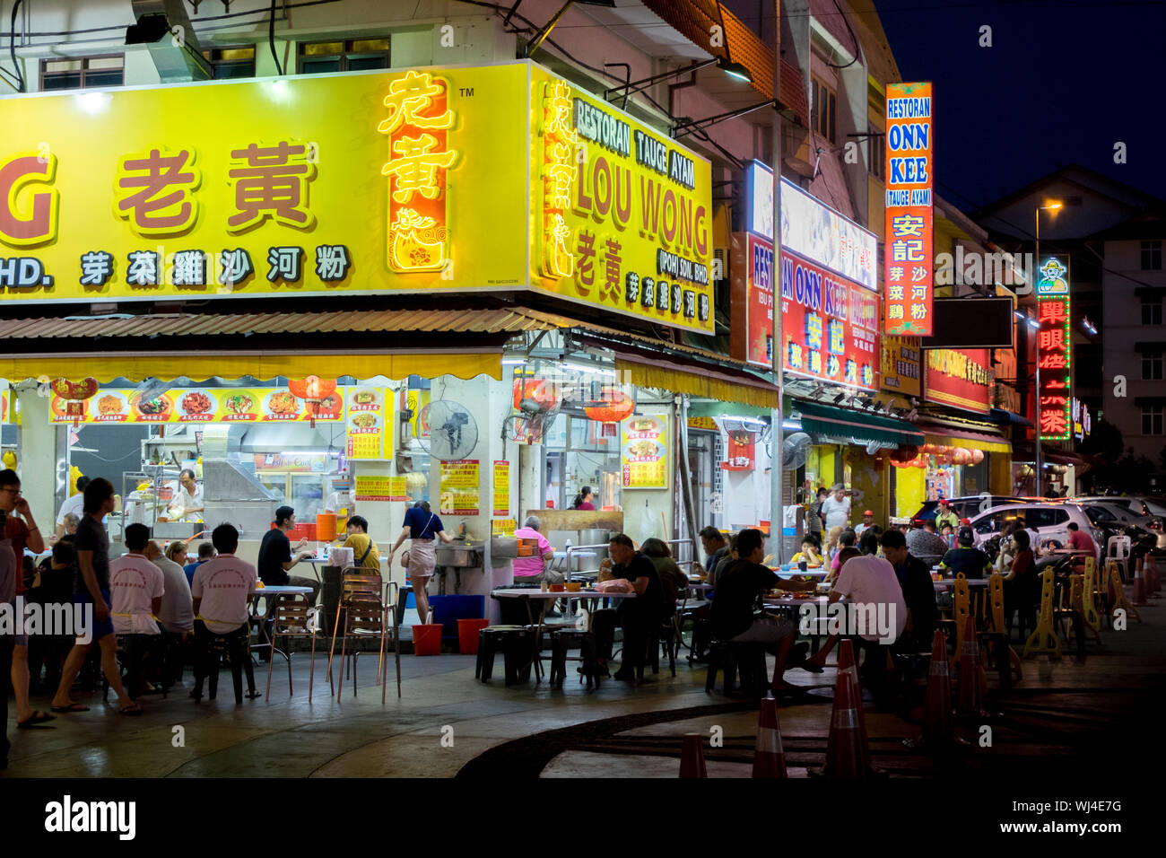 A night look at chicken resturants all lit up Chinatown in Ipoh ...