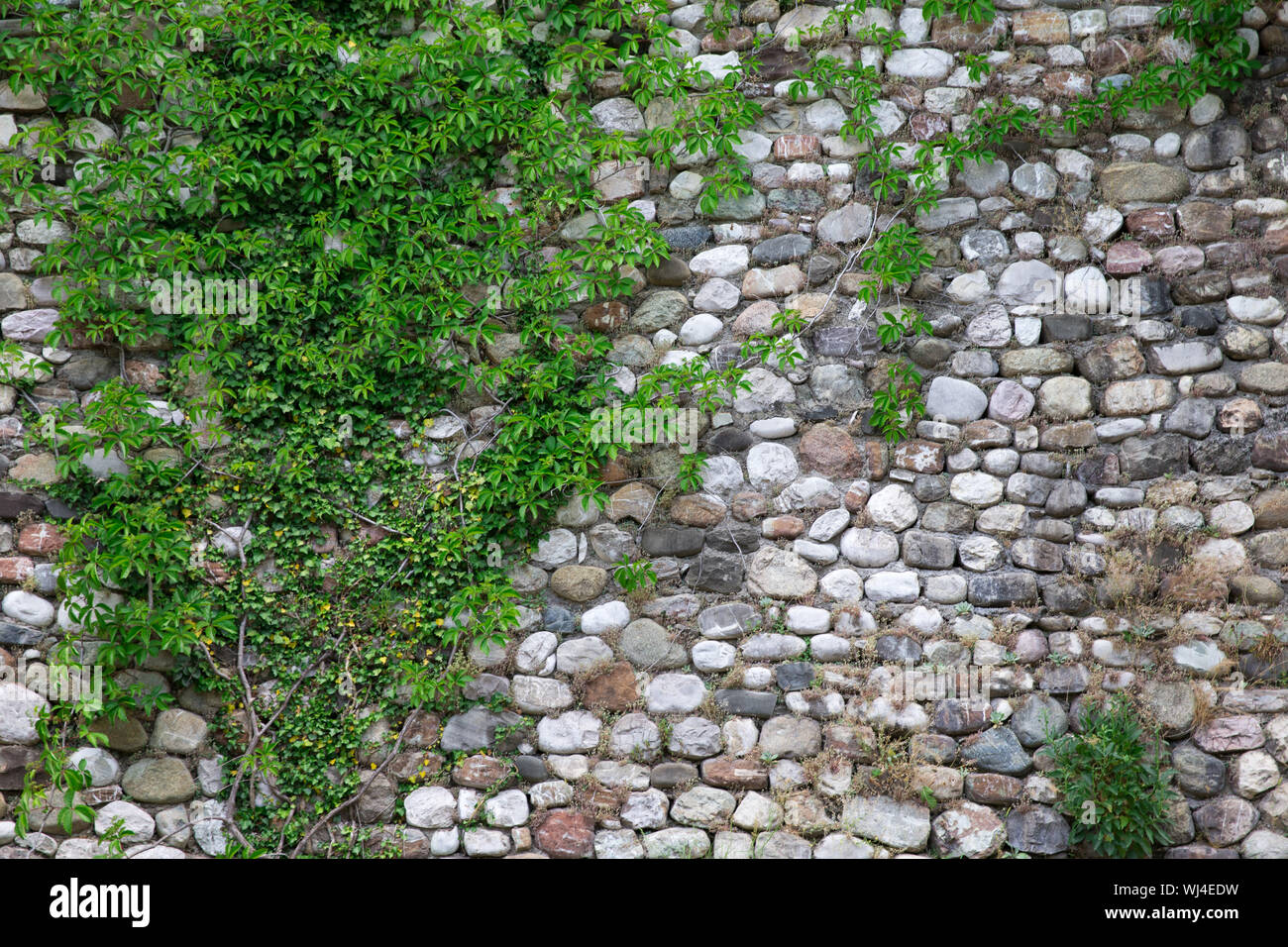 Background of stone wall texture Stock Photo - Alamy