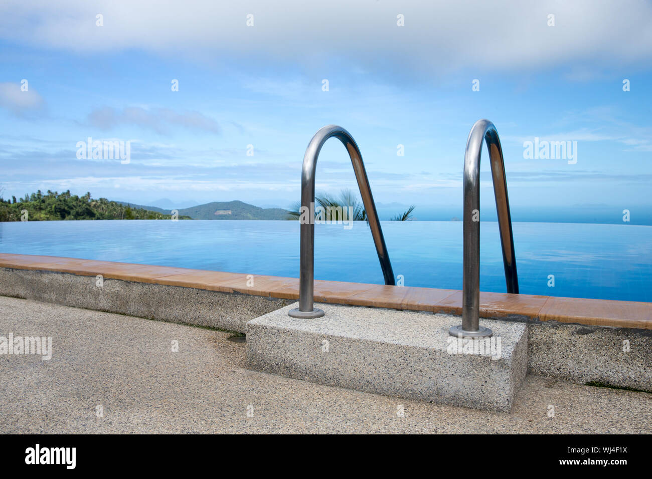 tropical swimming pool with coconut tree Stock Photo - Alamy
