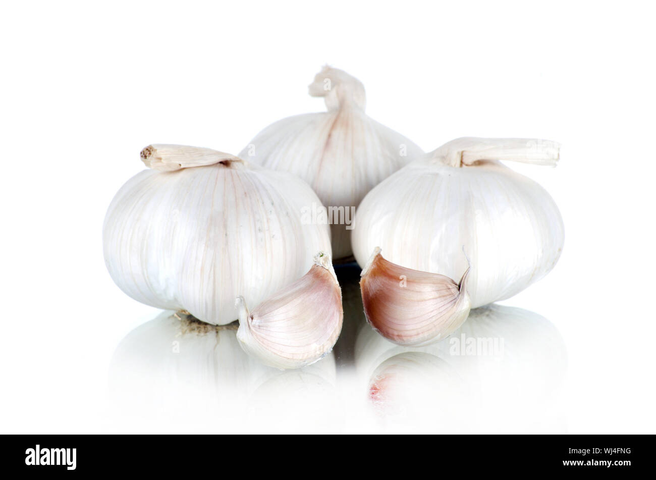 garlic isolated on a white Stock Photo - Alamy