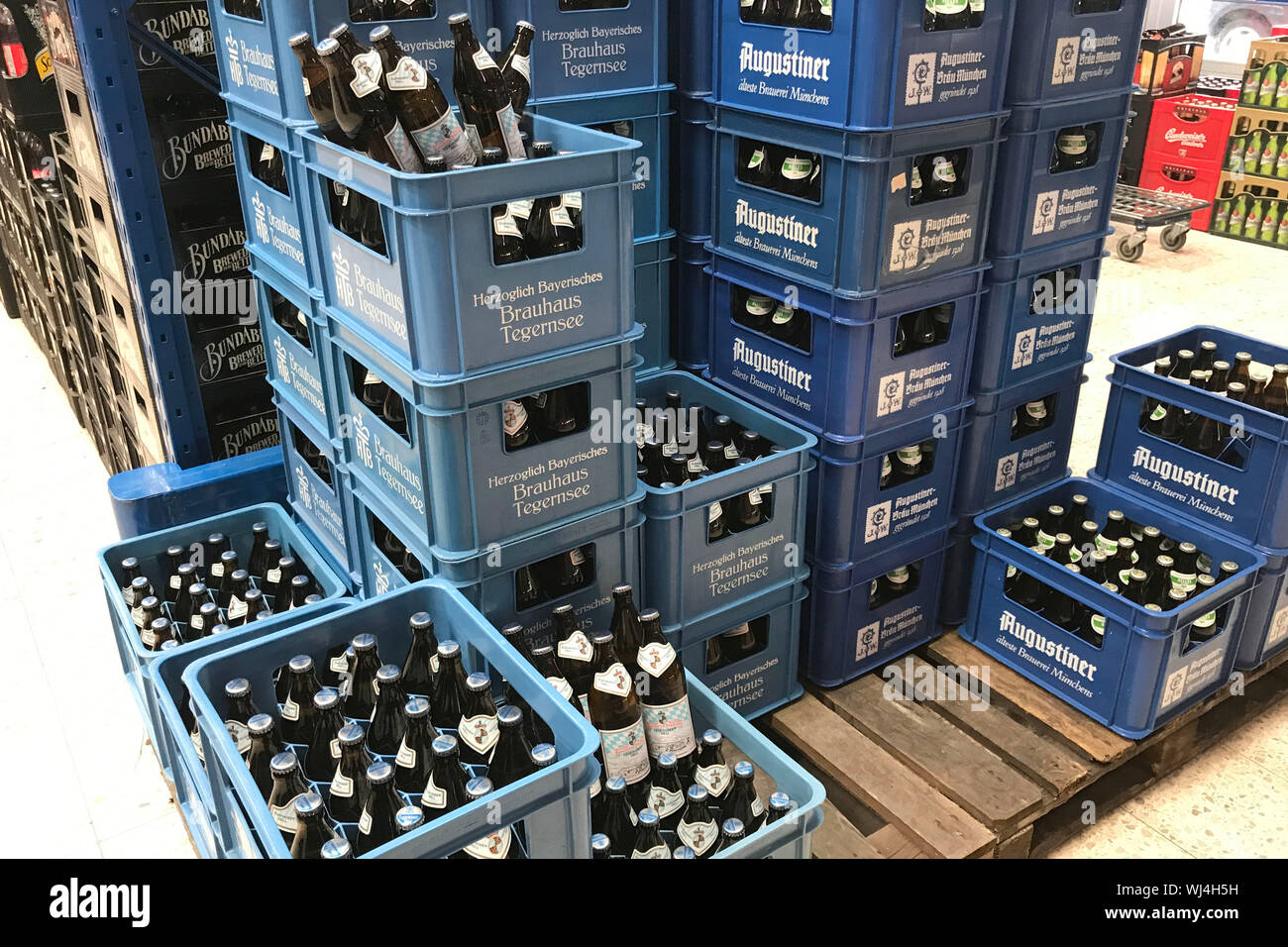 Munich, Deutschland. 03rd Sep, 2019. Stacked full beer crates in a ...
