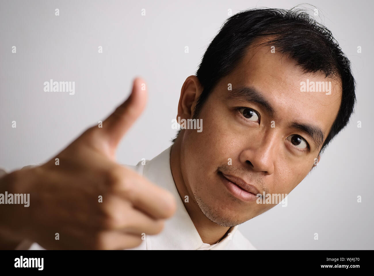 Mature business man give you a excellent sign, closeup portrait of ...