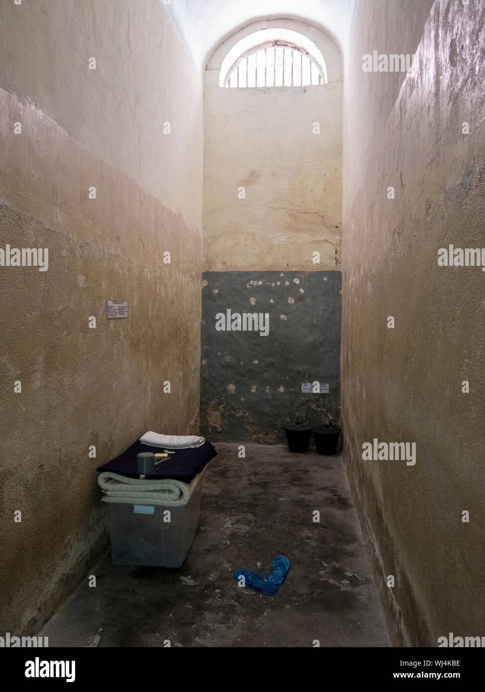 An isolation cell with prisoner supplies at the Prison Museum in ...