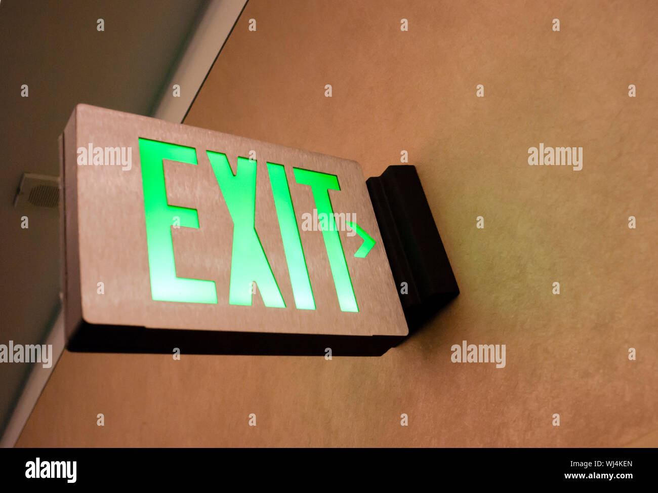 Lighted Wall Mounted Exit Sign Shows People Way Out Public Building ...