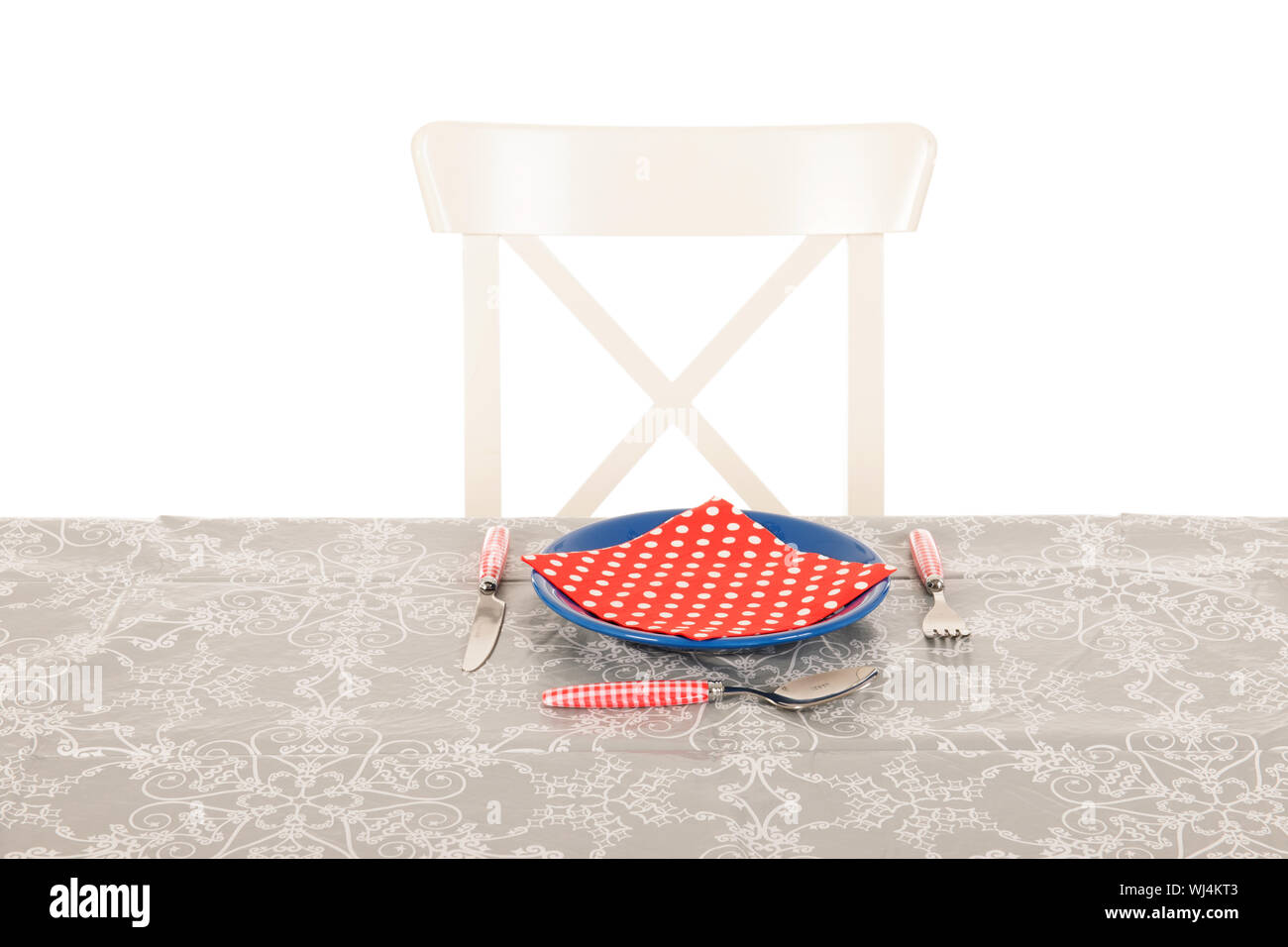 Table set with cloth plate and silverware Stock Photo - Alamy