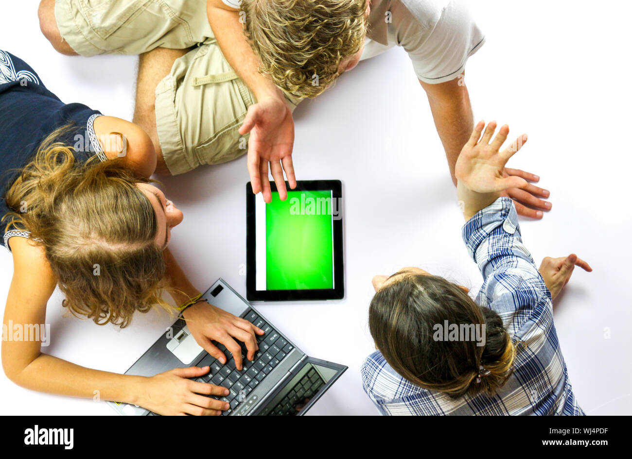 Teenagers and laptop screen and tablet hi-res stock photography and ...