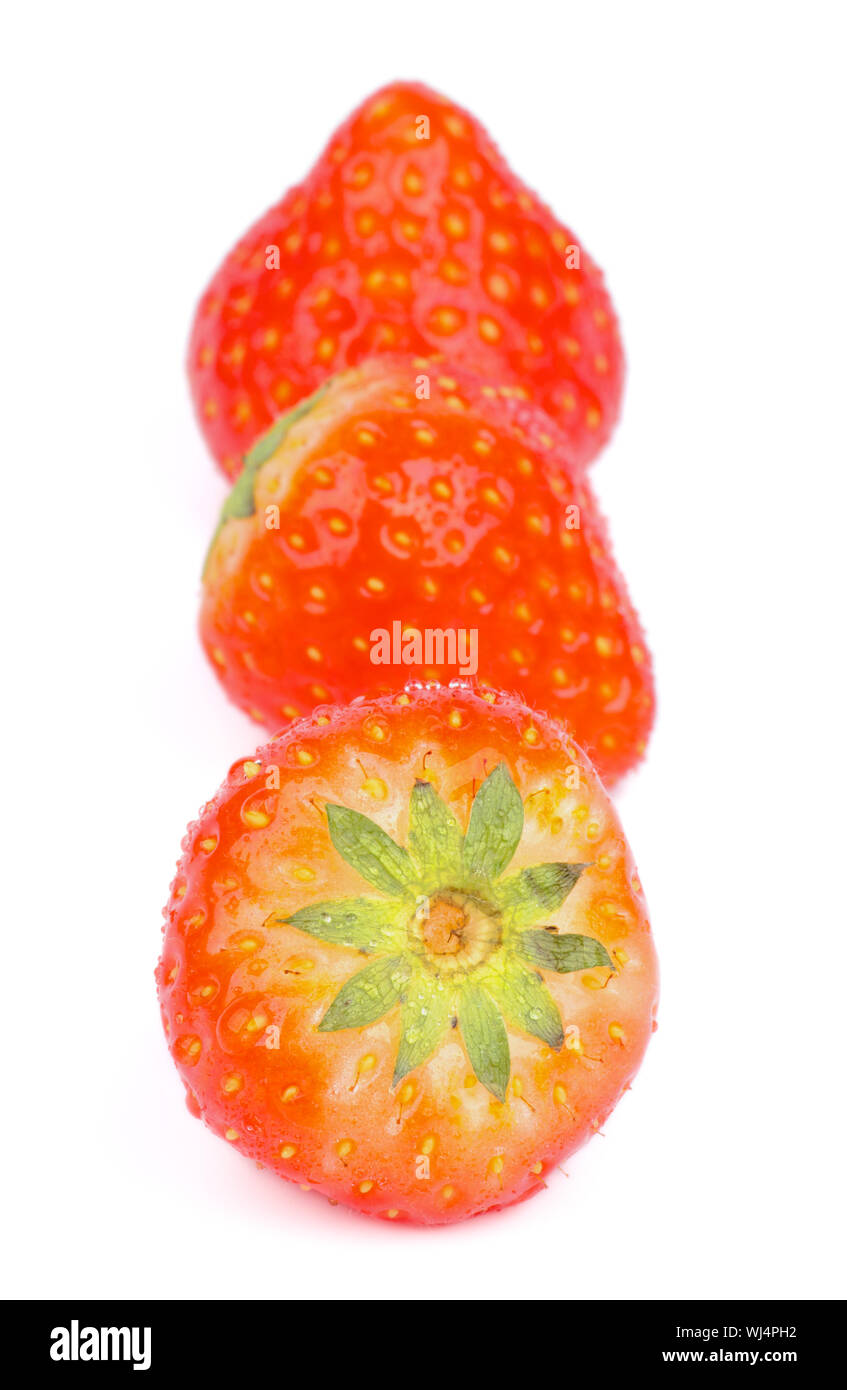 Three Fresh Ripe Strawberries In a Row isolated on white background ...