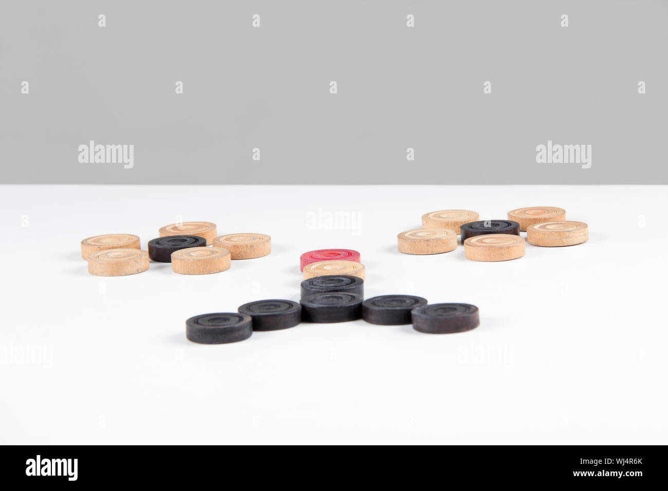 Close up of carrom pieces with representing sad face Stock Photo - Alamy