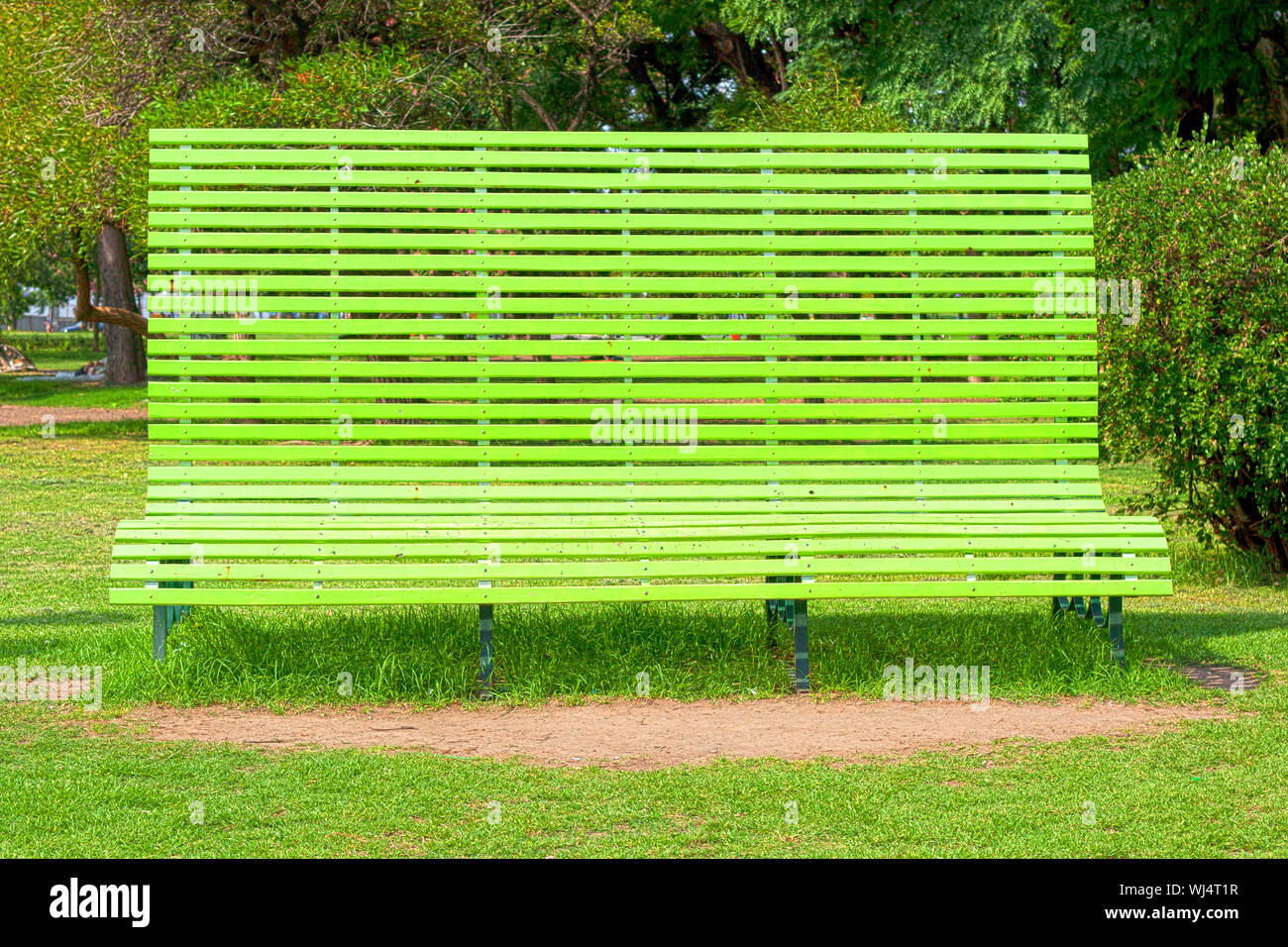 gigantic green bench in the park Stock Photo - Alamy