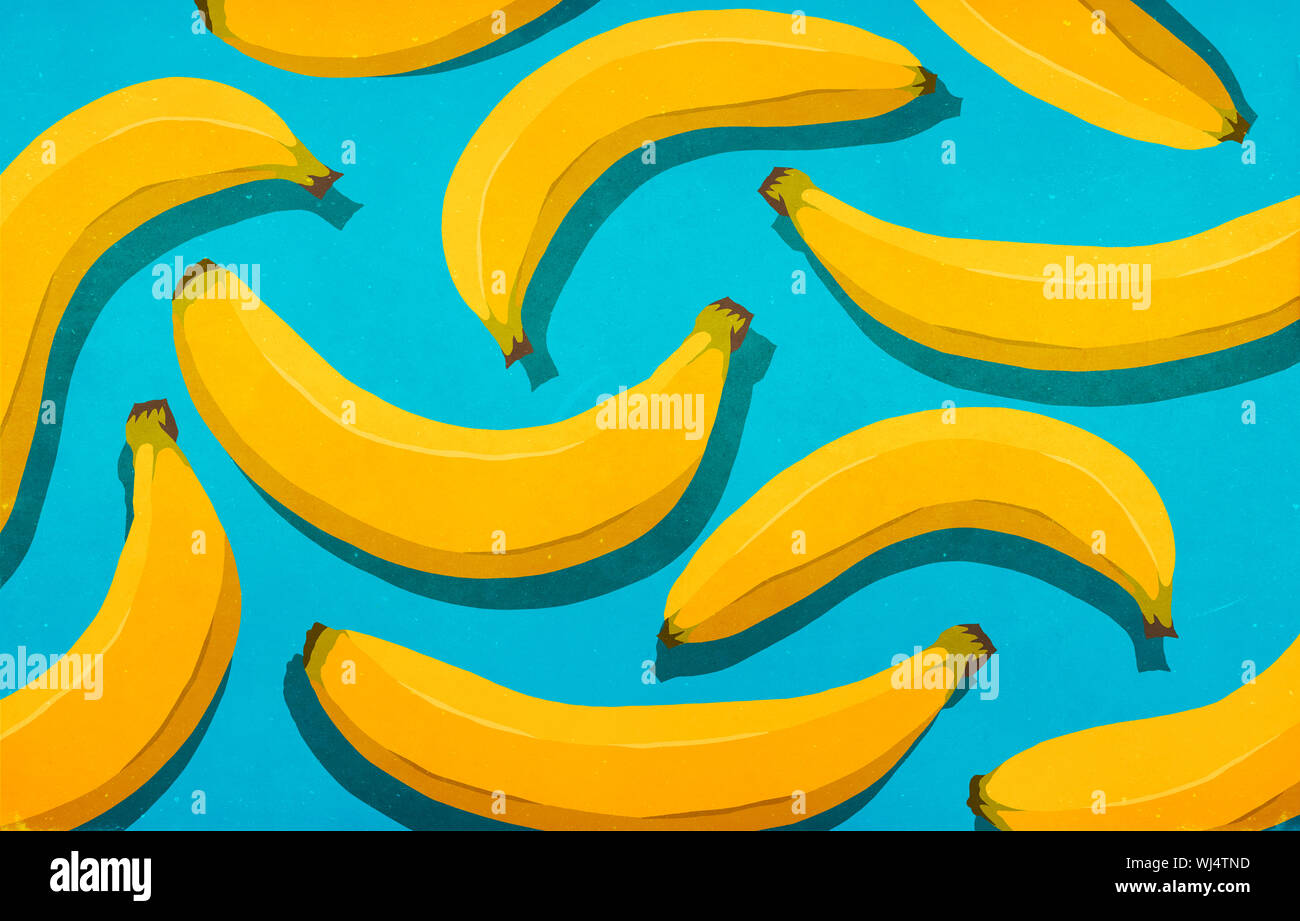 Vibrant, unpeeled yellow bananas on blue background Stock Photo - Alamy