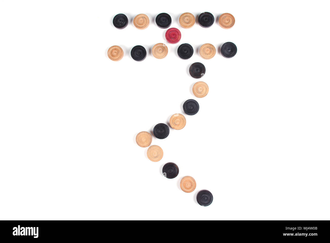 Carrom pieces in shape of Indian rupee symbol Stock Photo - Alamy