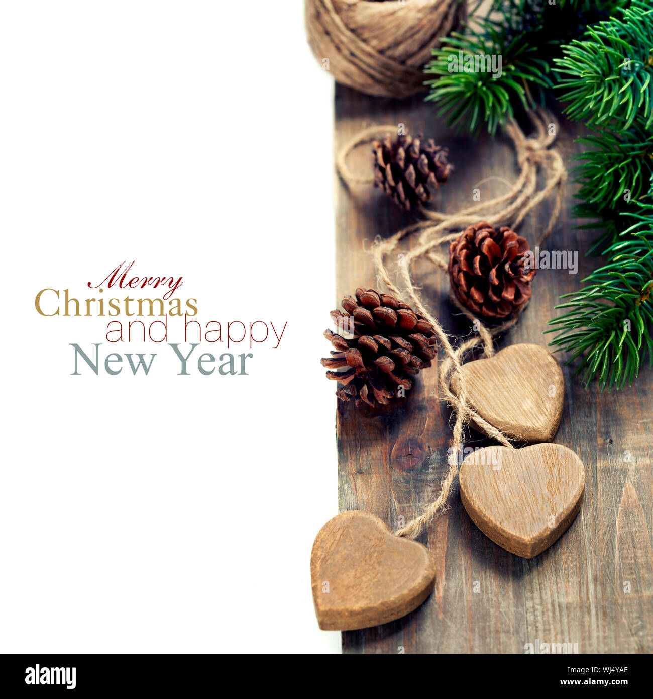 Christmas border design on the wooden background Stock Photo - Alamy