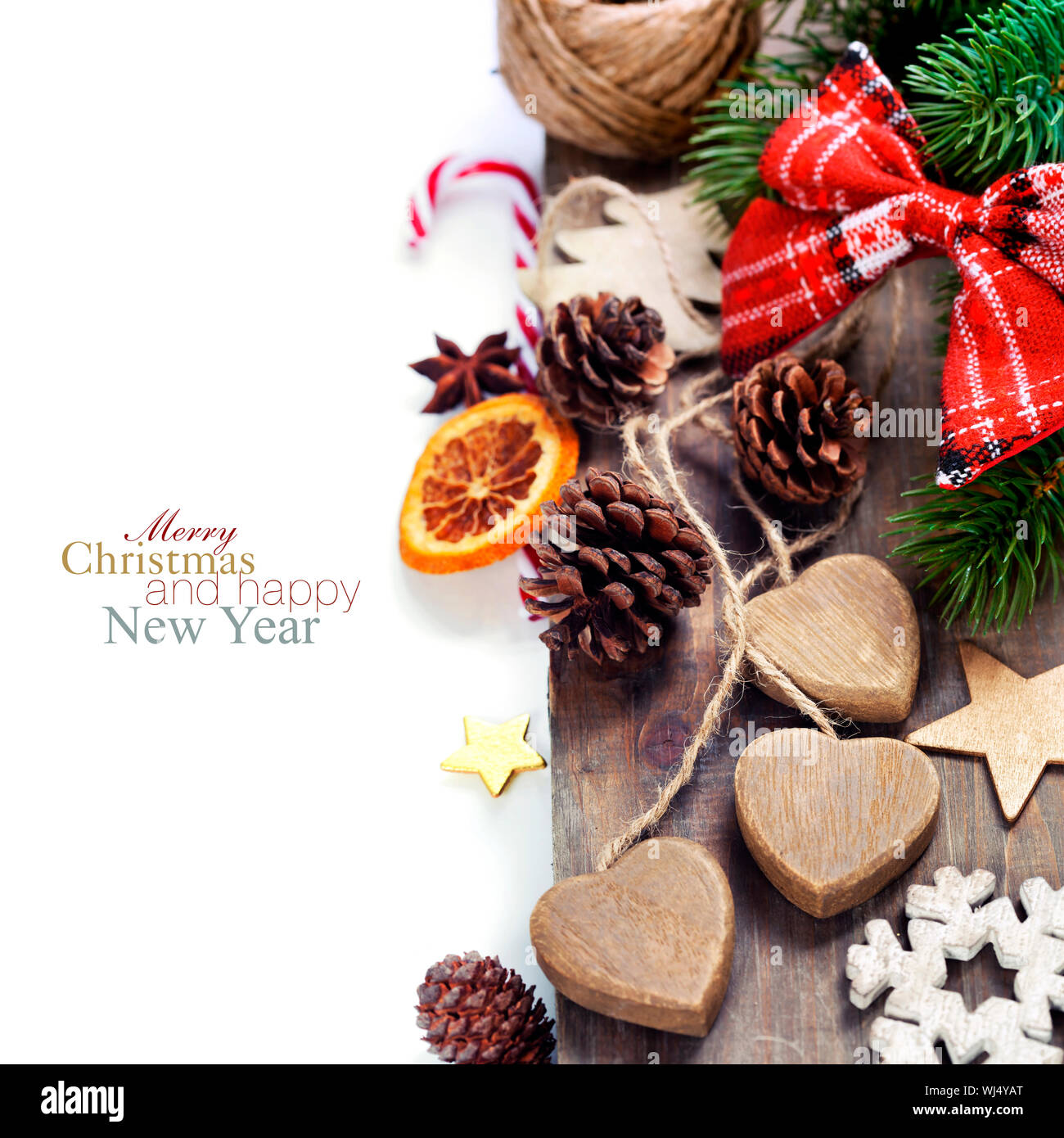 Christmas border design on the wooden background Stock Photo - Alamy