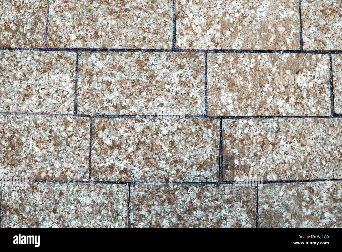 Natural gray stone and red granite background. Cladding material ...