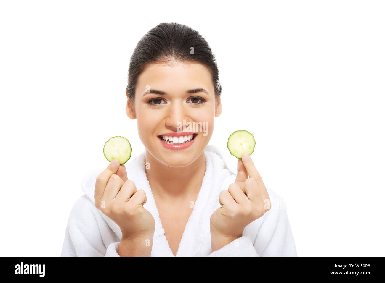 Girl holding cucumbers hi-res stock photography and images - Alamy