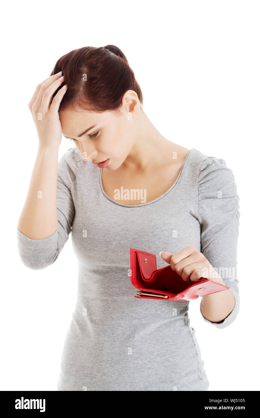 Beautiful casual woman with empty wallet, worrying. Isolated on white ...