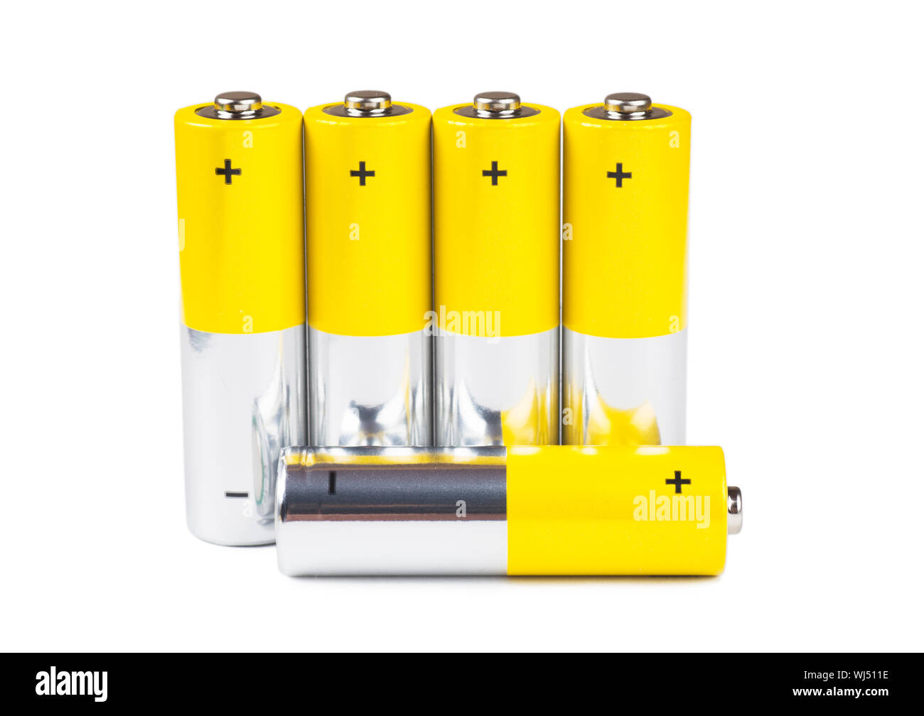 A row of yellow batteries isolated over white background Stock Photo ...