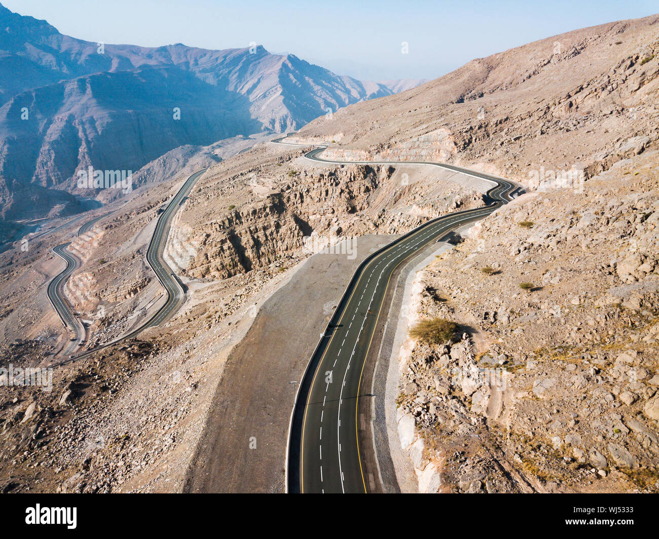 Scenic desert road in Ras al Khaimah emirate in the UAE aerial view ...
