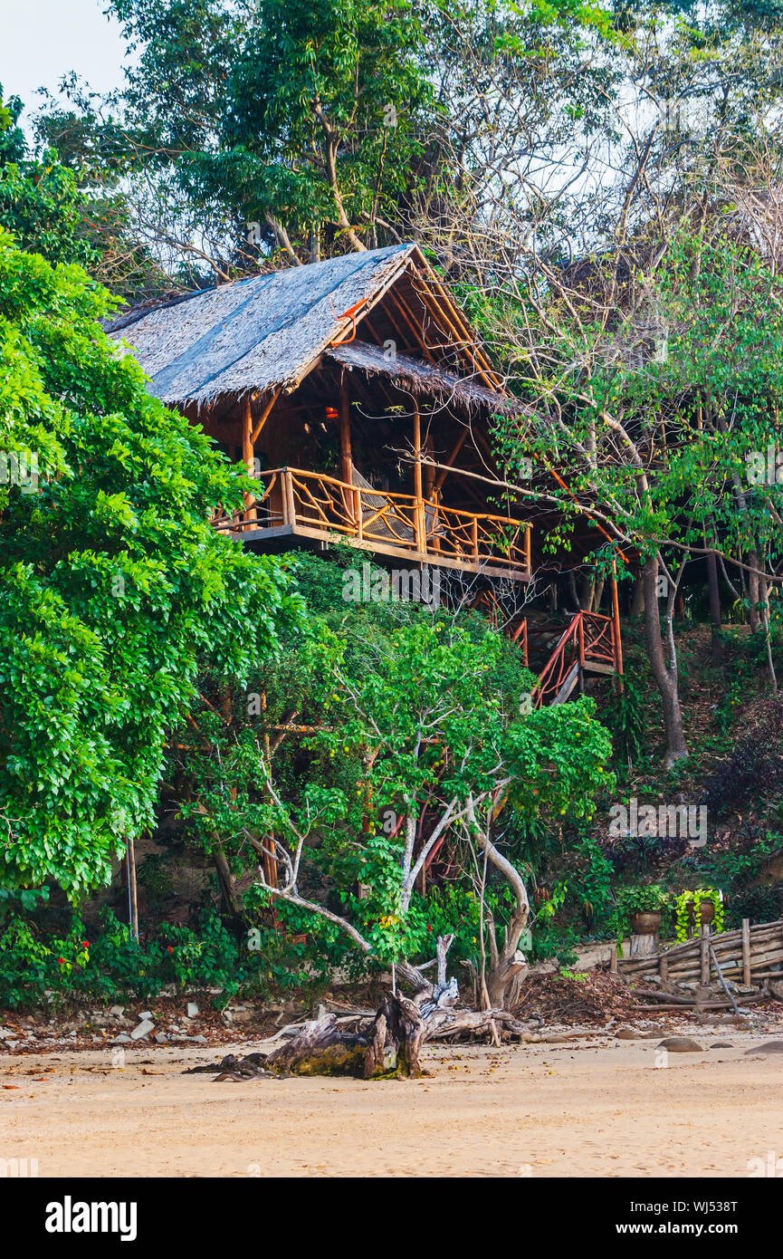 Hut in the jungle by the sea on a deserted island Stock Photo - Alamy
