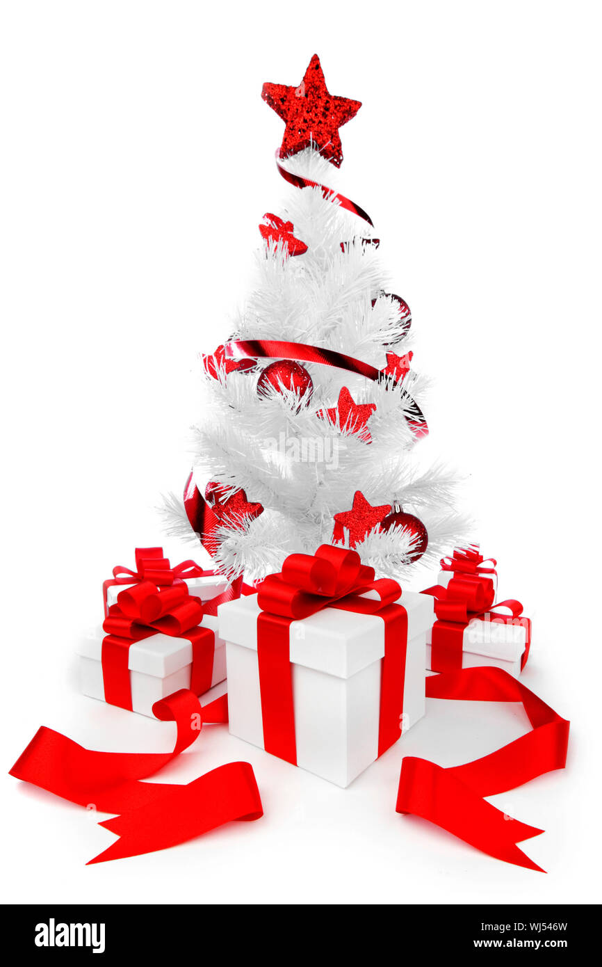 Christmas tree and gifts isolated on white background Stock Photo - Alamy
