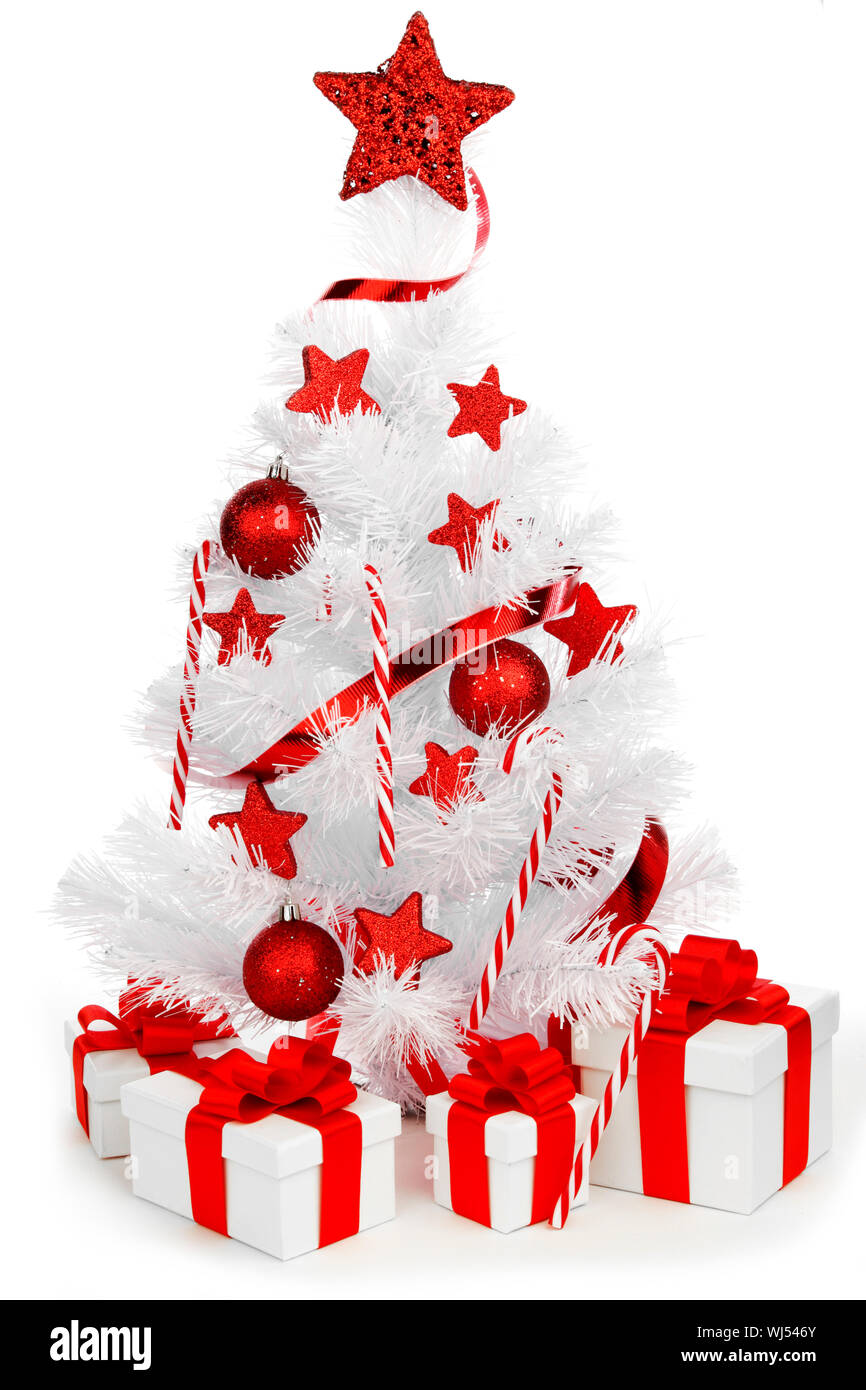 Christmas tree and gifts isolated on white background Stock Photo - Alamy