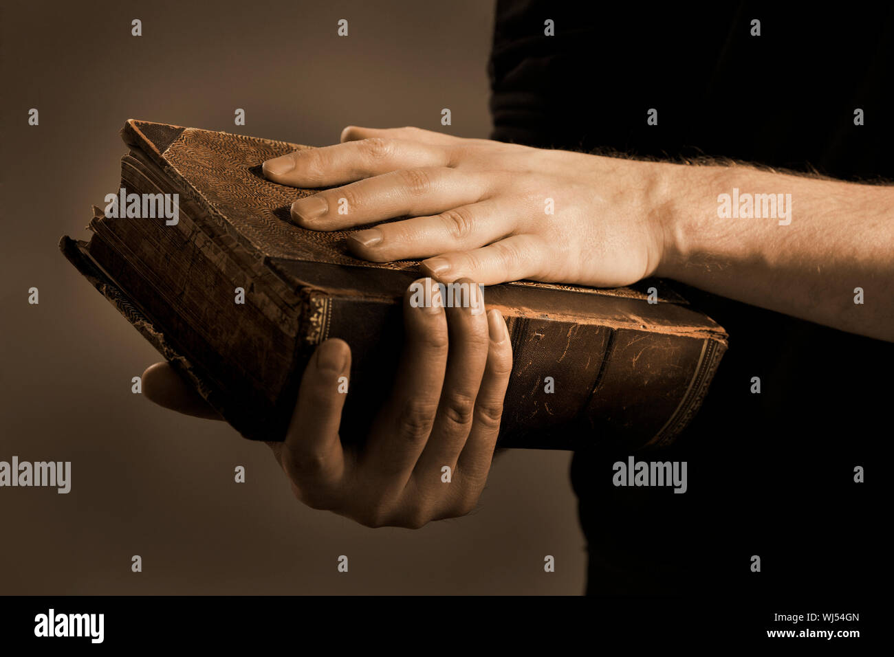 Hand Holding Bible High Resolution Stock Photography and Images - Alamy