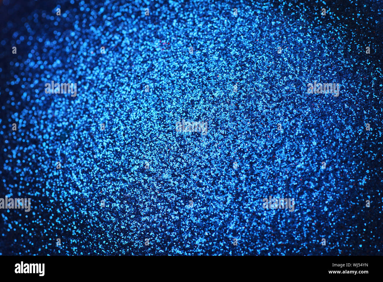 Blue metallic sparkling background with vignetting Stock Photo - Alamy