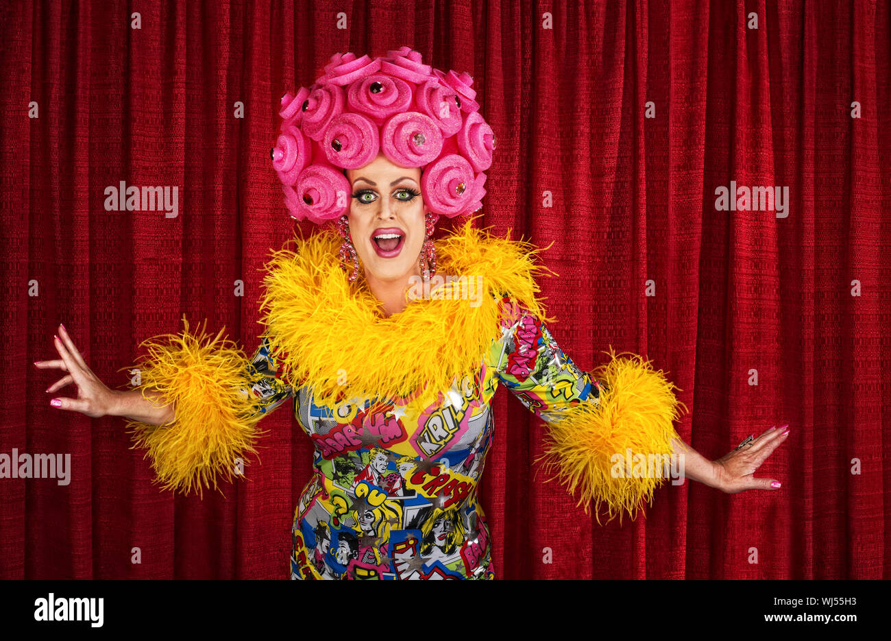 Big drag queen performing a song in theater Stock Photo - Alamy