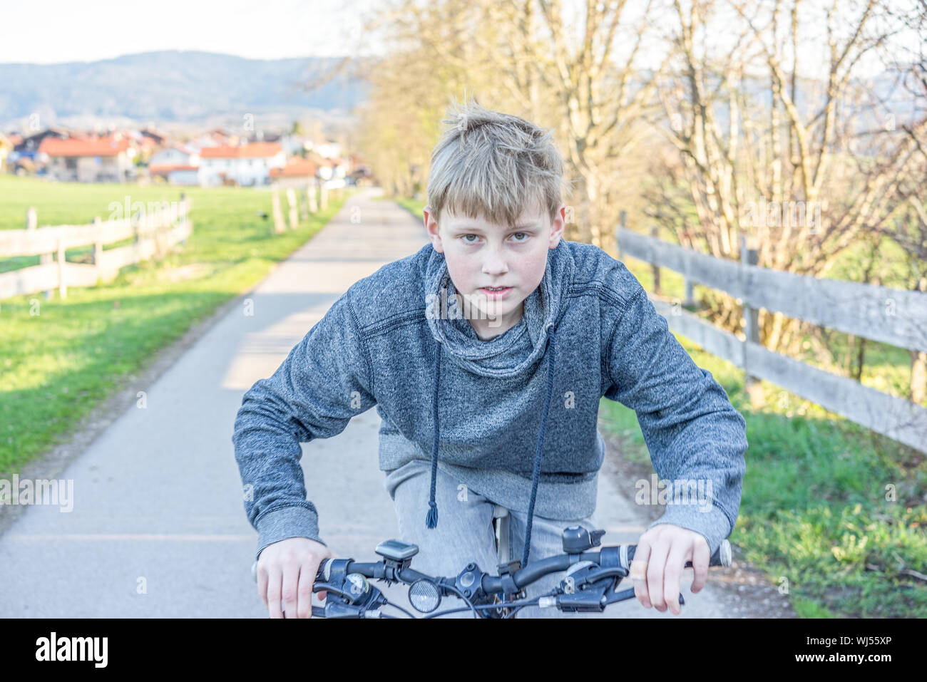 Riding bicycle hi-res stock photography and images - Alamy