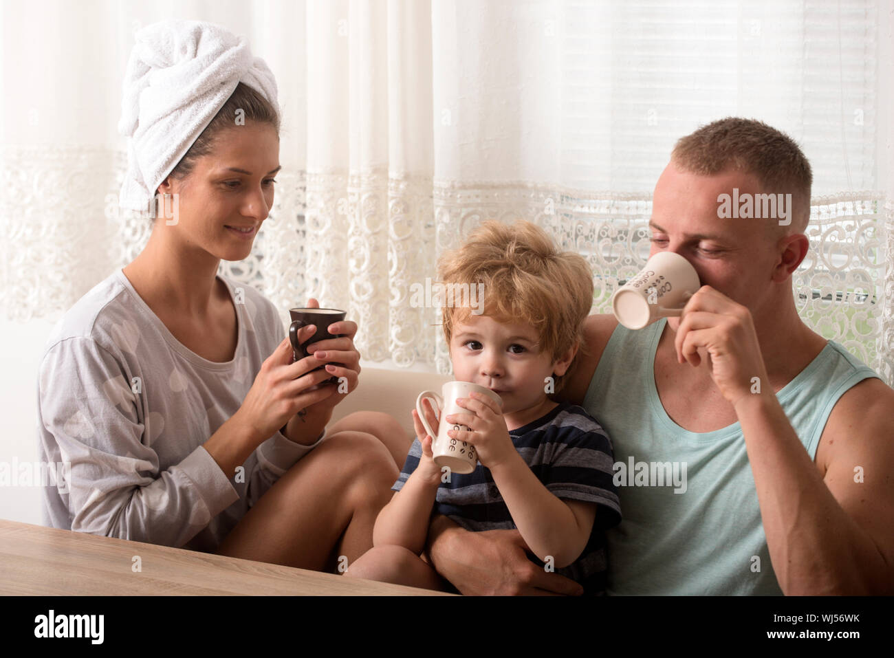Perfect morning of happy family drinking coffee. Love and trust as ...