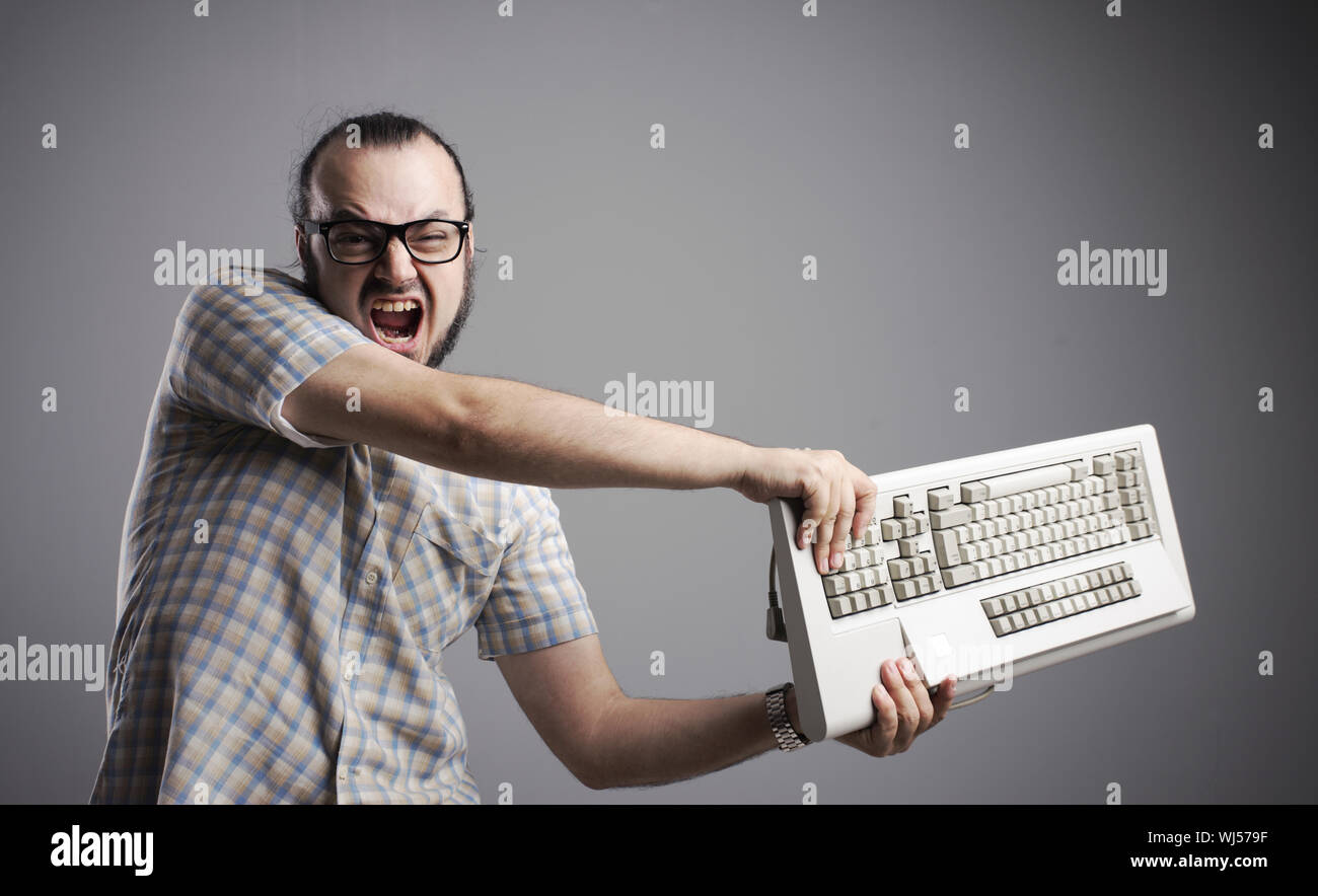 Man destroying computer hi-res stock photography and images - Alamy