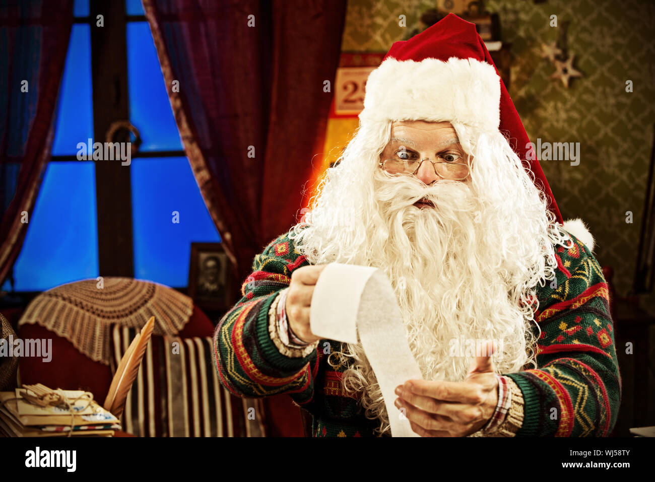 Santa Claus accountant going over figures and very upset by the result ...