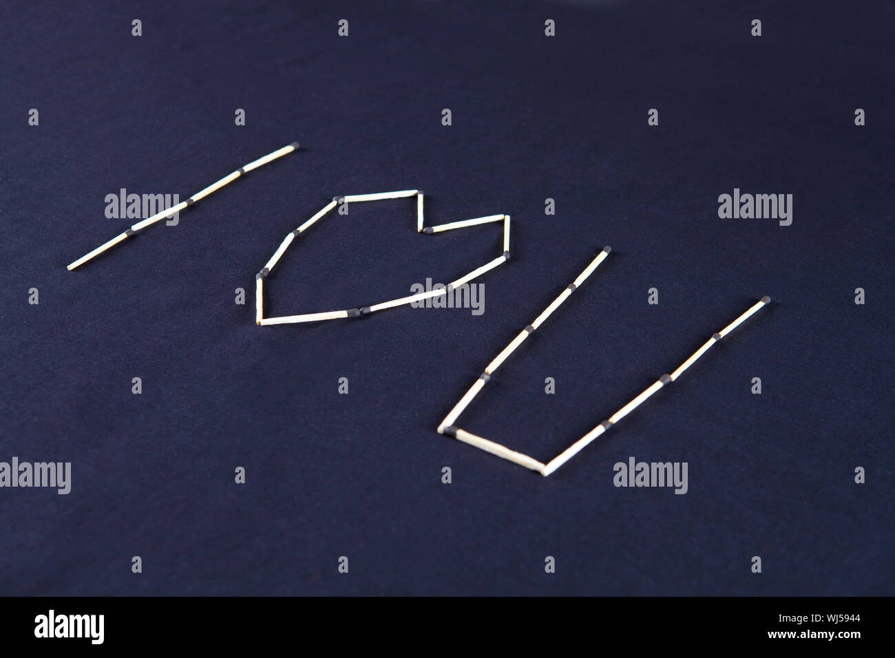 Words "i love u" made of matchsticks Stock Photo - Alamy