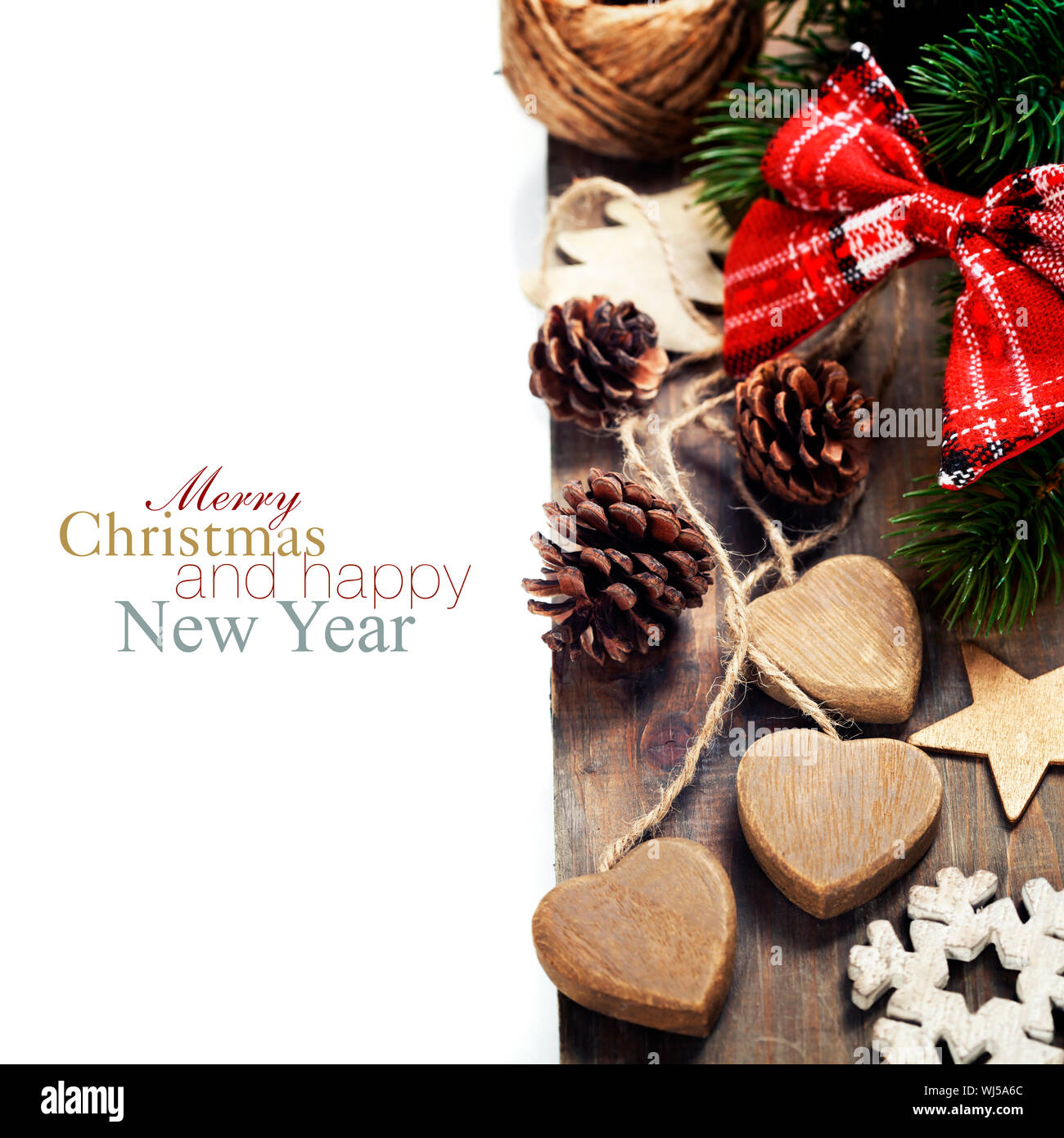 Christmas border design on the wooden background Stock Photo - Alamy