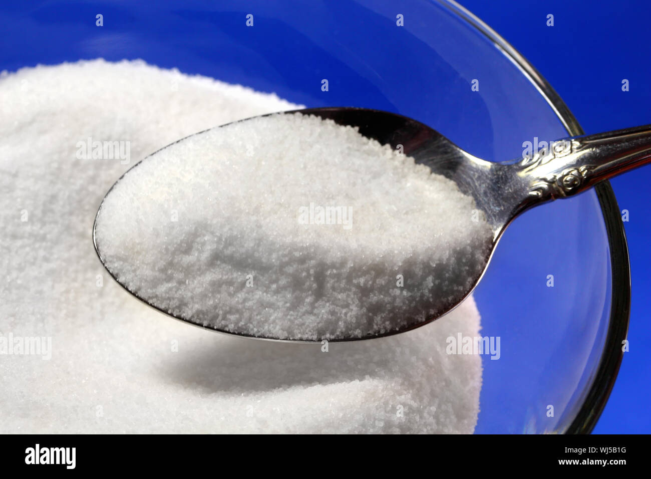 Spoonful of sugar Stock Photo - Alamy
