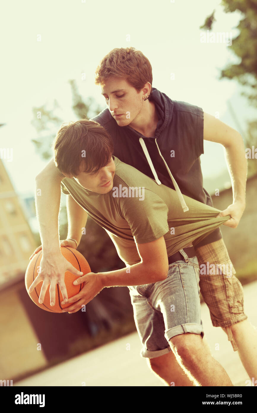 Two guys playing basketball hi-res stock photography and images - Alamy