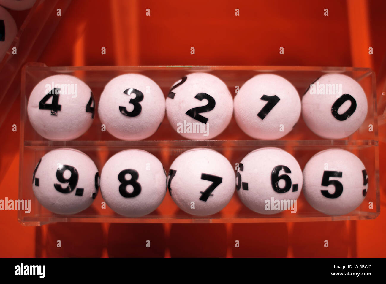 white balls with numbers for the game of lottery Stock Photo - Alamy