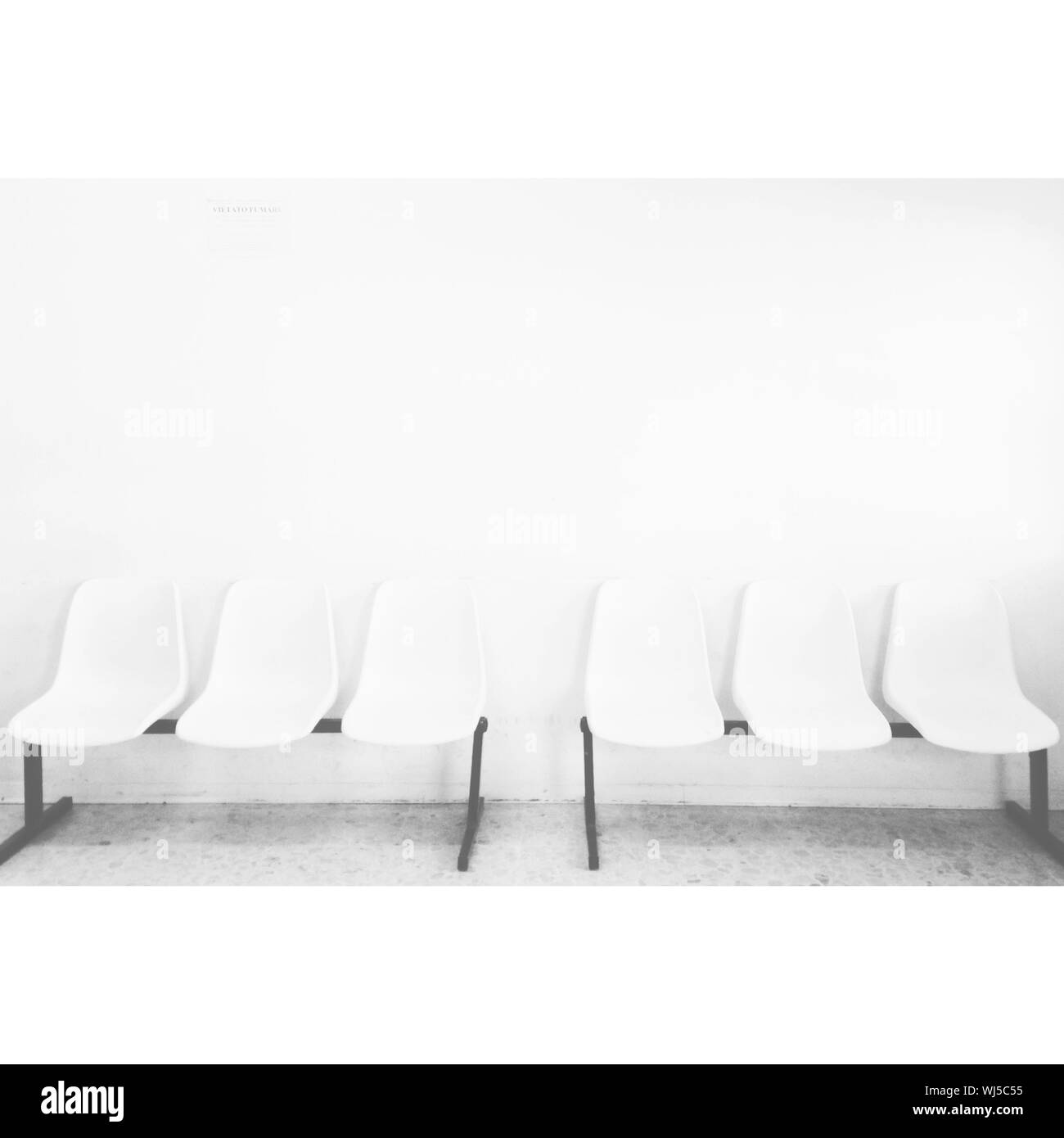 Plastic chairs in waiting room hi-res stock photography and images - Alamy