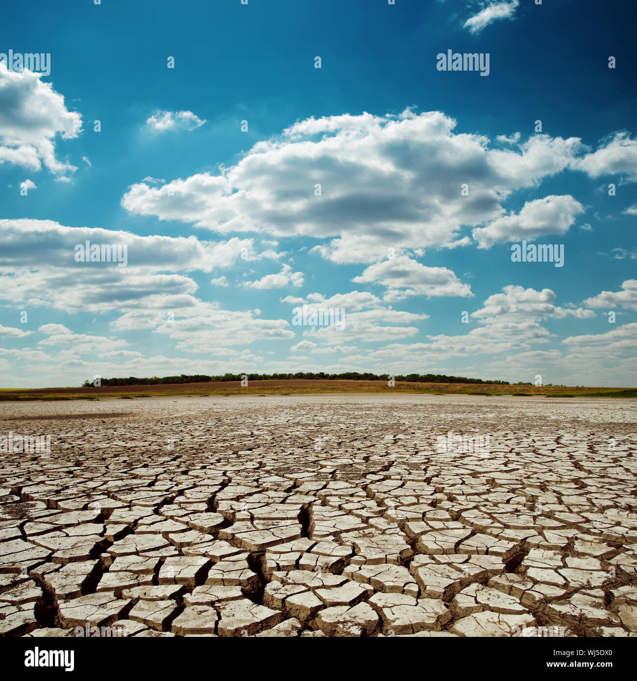 drought earth under dramatic sky Stock Photo - Alamy