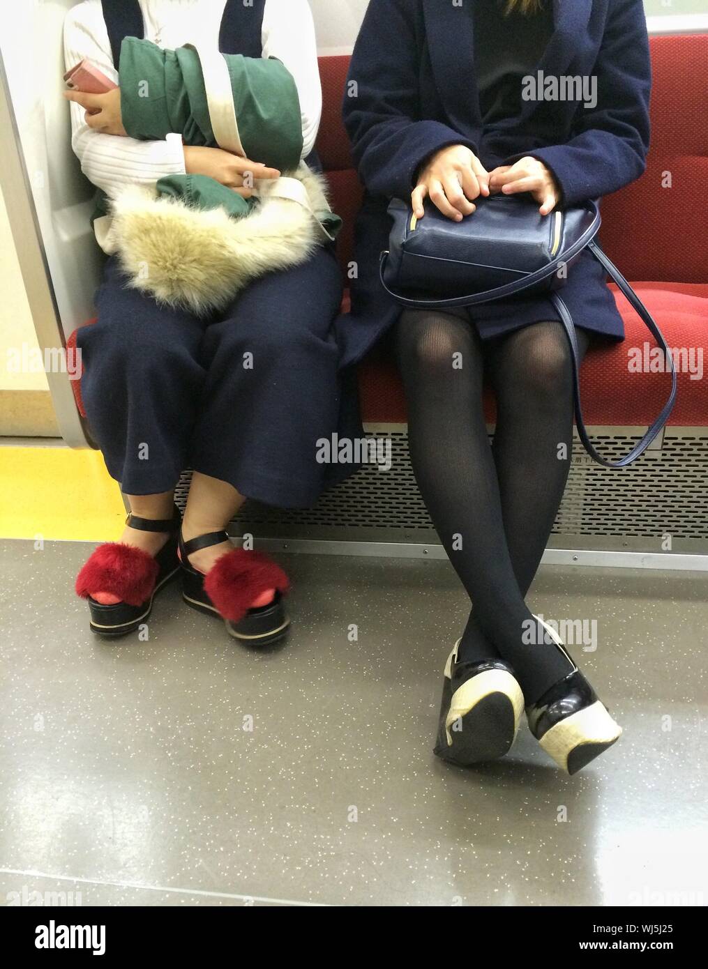 Two people sitting in train hi-res stock photography and images - Alamy