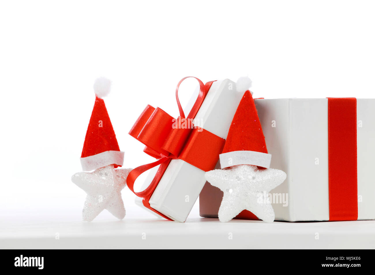 Santa Stars and gifts isolated on white background Stock Photo - Alamy
