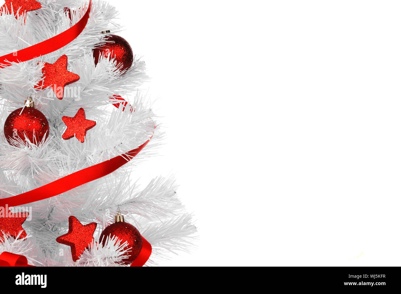 Christmas tree with red decoration isolated on white background Stock ...