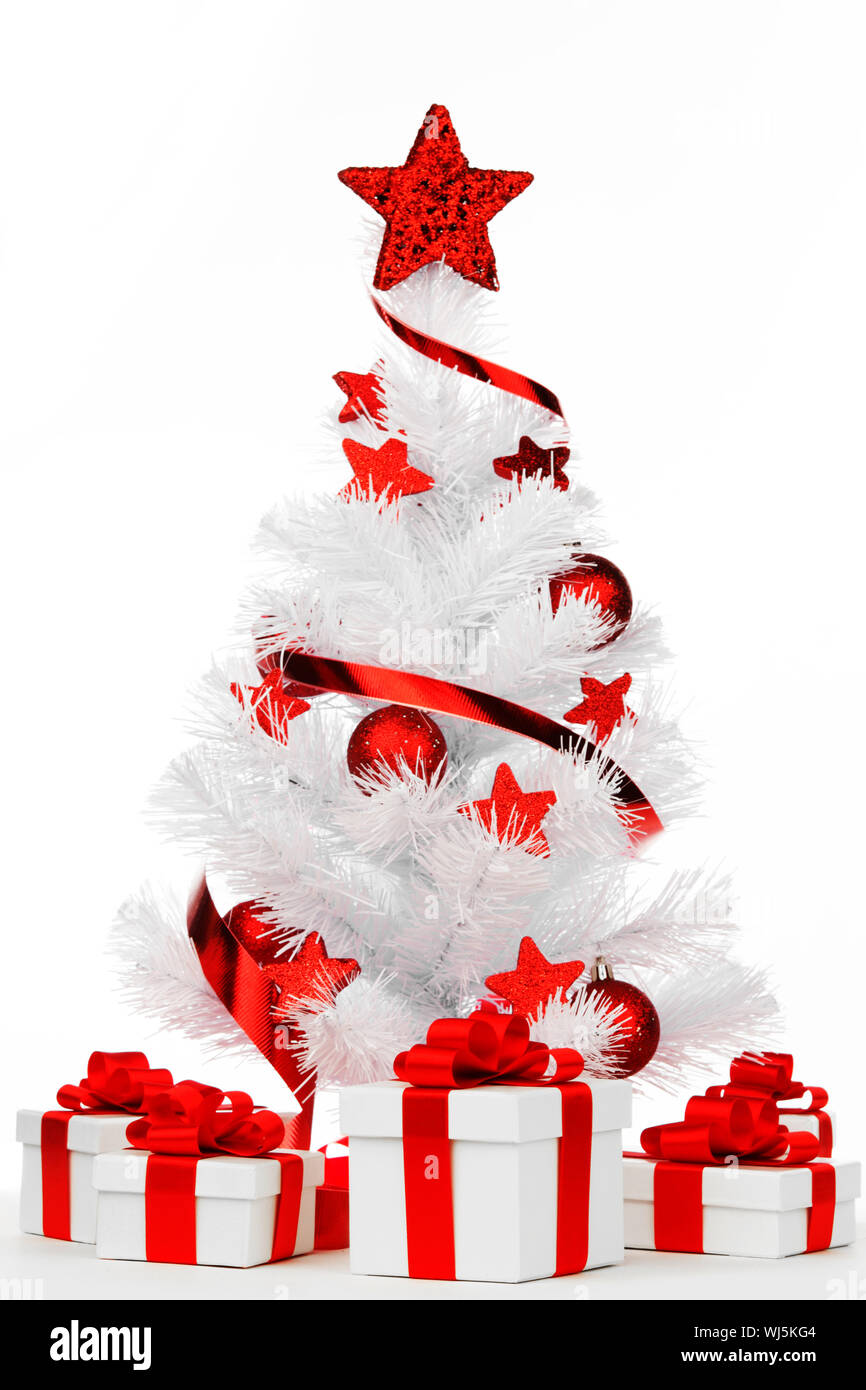 Christmas tree and gifts isolated on white background Stock Photo - Alamy