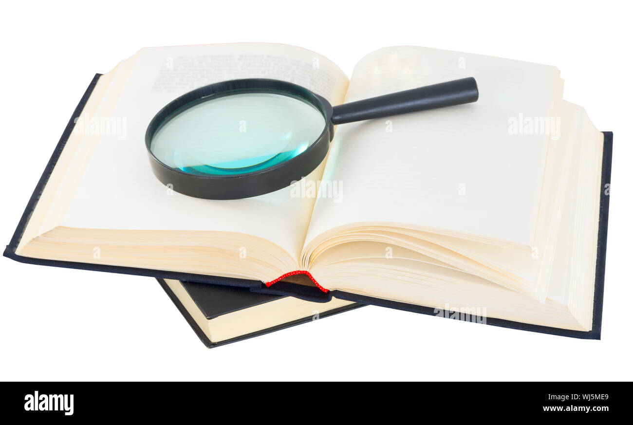 Books and magnifying glass on the white background Stock Photo - Alamy